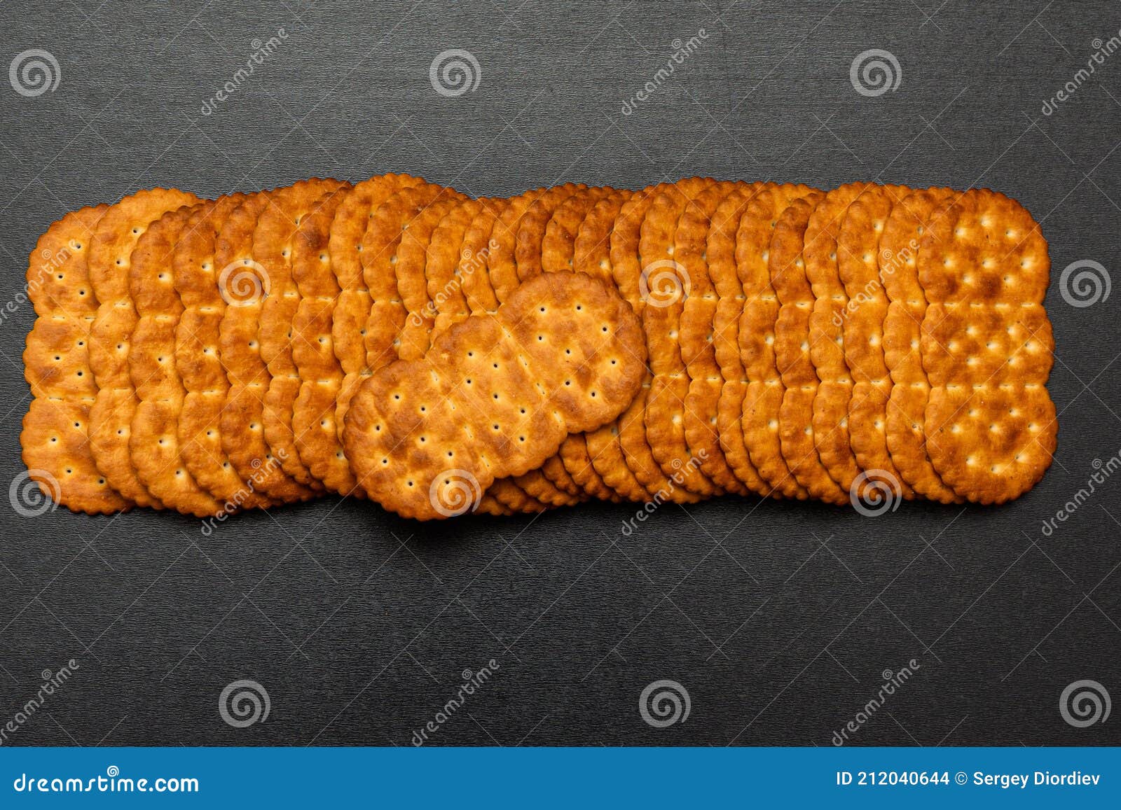 A Stack of Crackers on a Black Background. Stock Photo - Image of ...