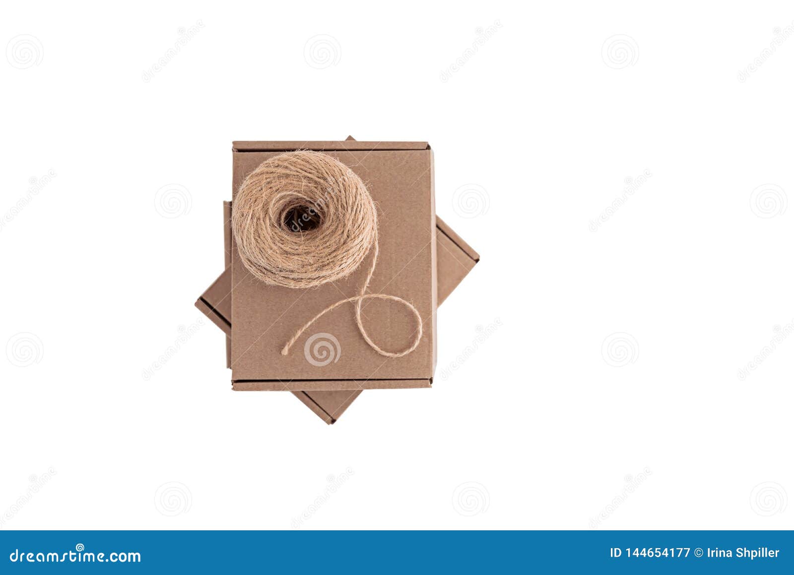 Stack of Craft Paper Boxes and Coil of Rope Isolated on White Stock ...