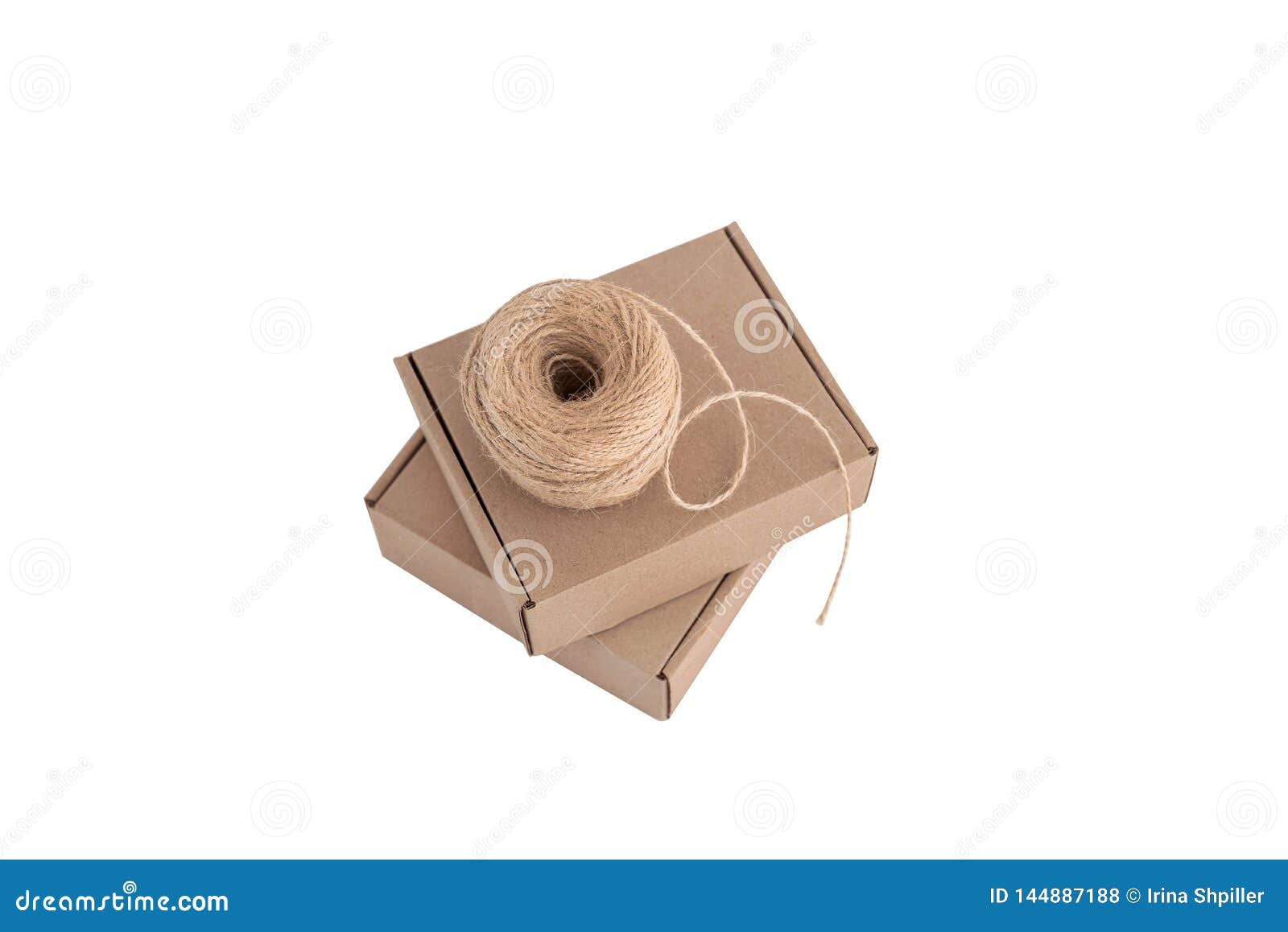 Stack of Craft Paper Boxes and Coil of Rope Isolated on White Stock ...