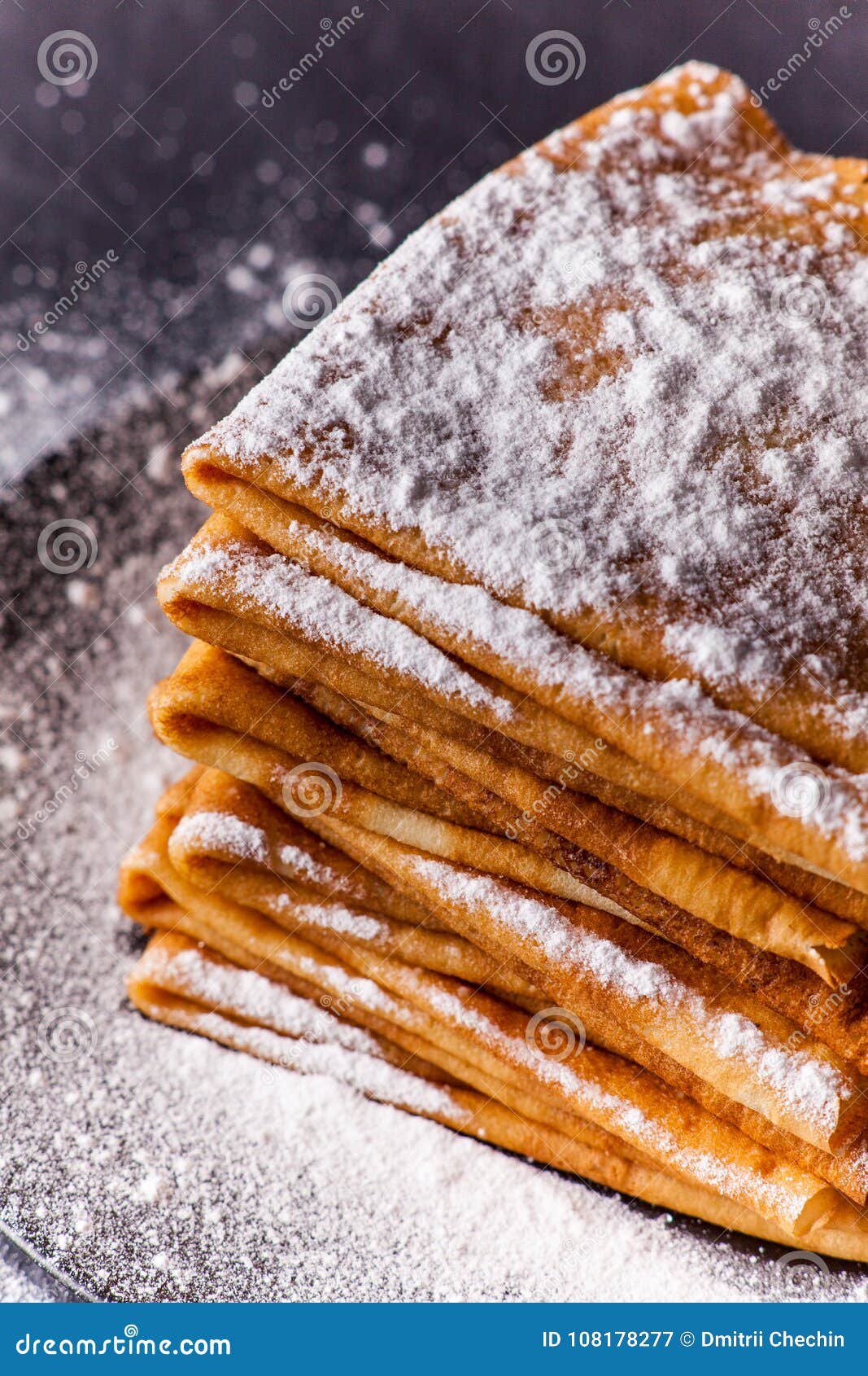 Stack of Crepes with Powdered Sugar on Dark Background. Stock Image ...