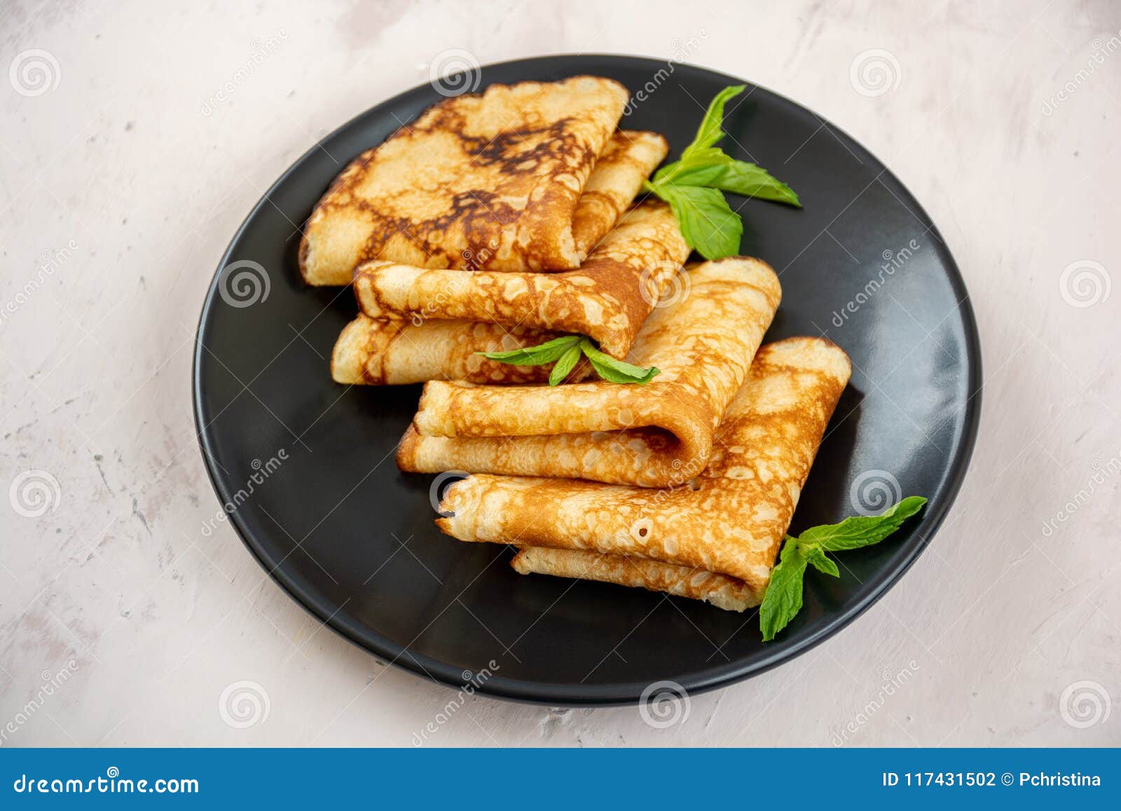 Stack of crepes stock photo. Image of dish, green, russian - 117431502