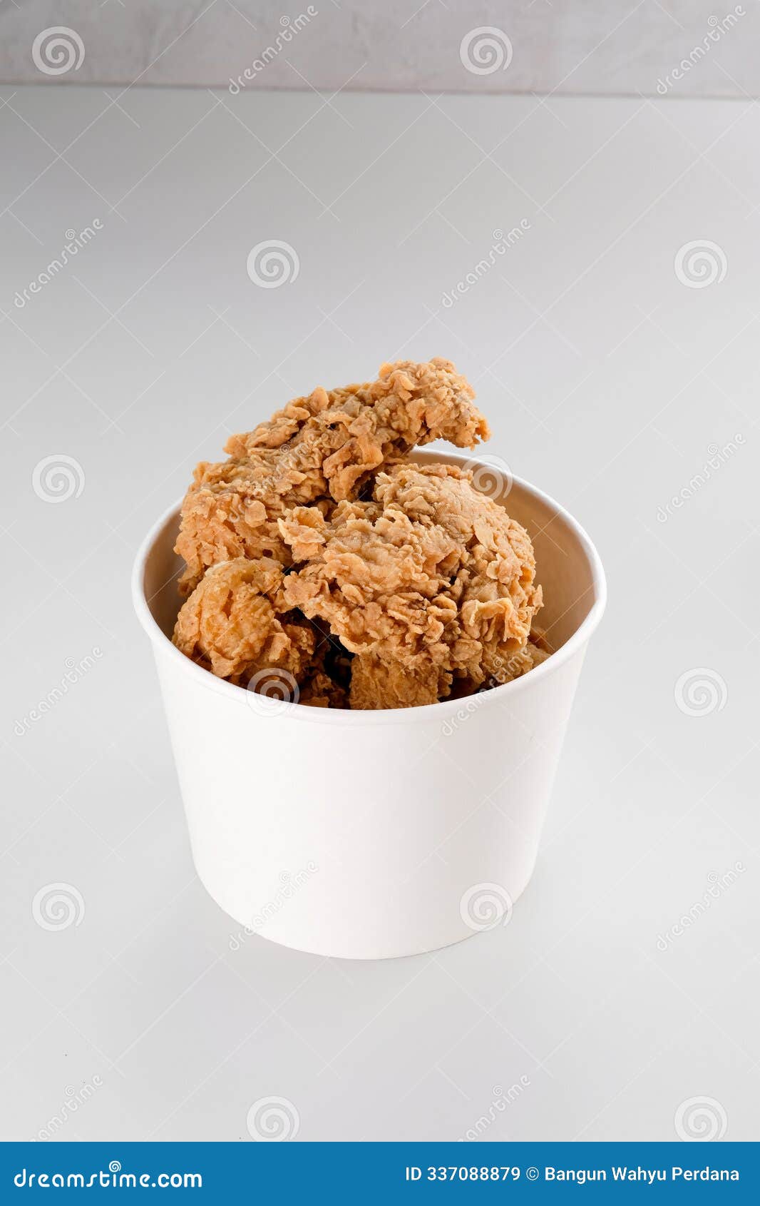 A Stack of Crispy Fried Chicken in a White Bucket. Stock Image - Image ...