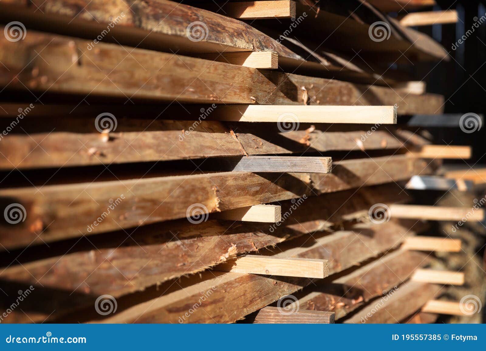 Stack of cut wooden boards stock image. Image of clog - 195557385