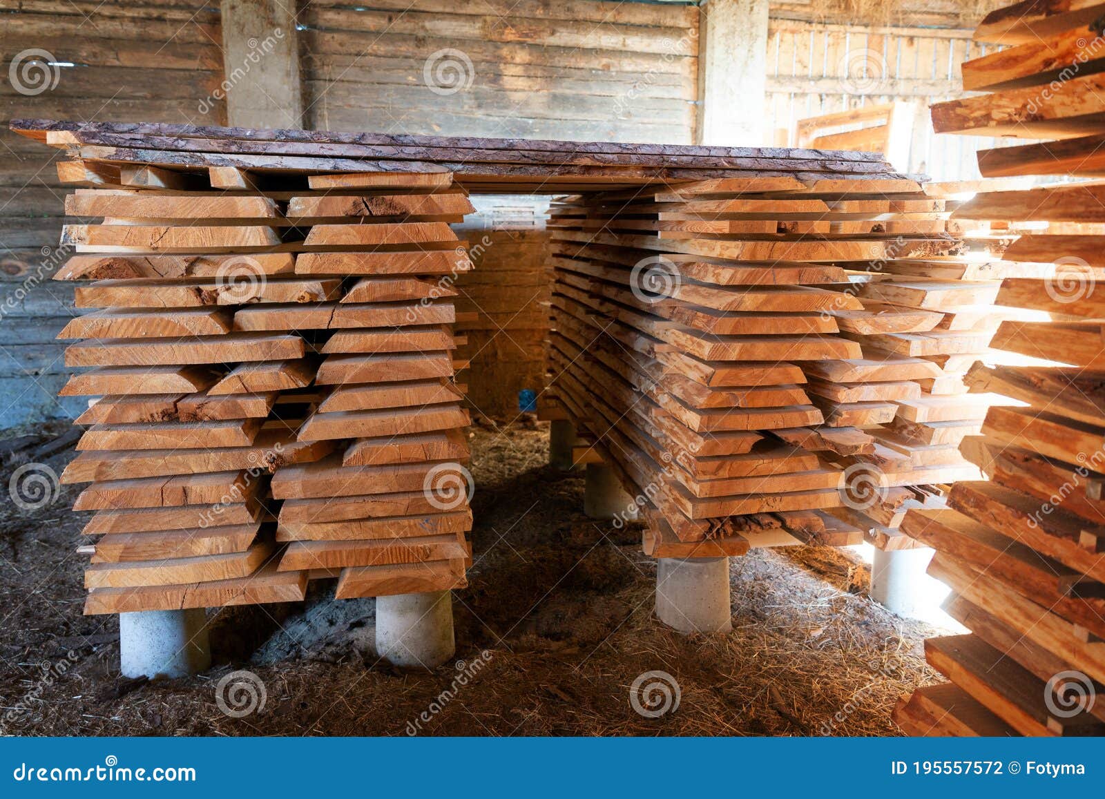 Stack of cut wooden boards stock photo. Image of heap - 195557572