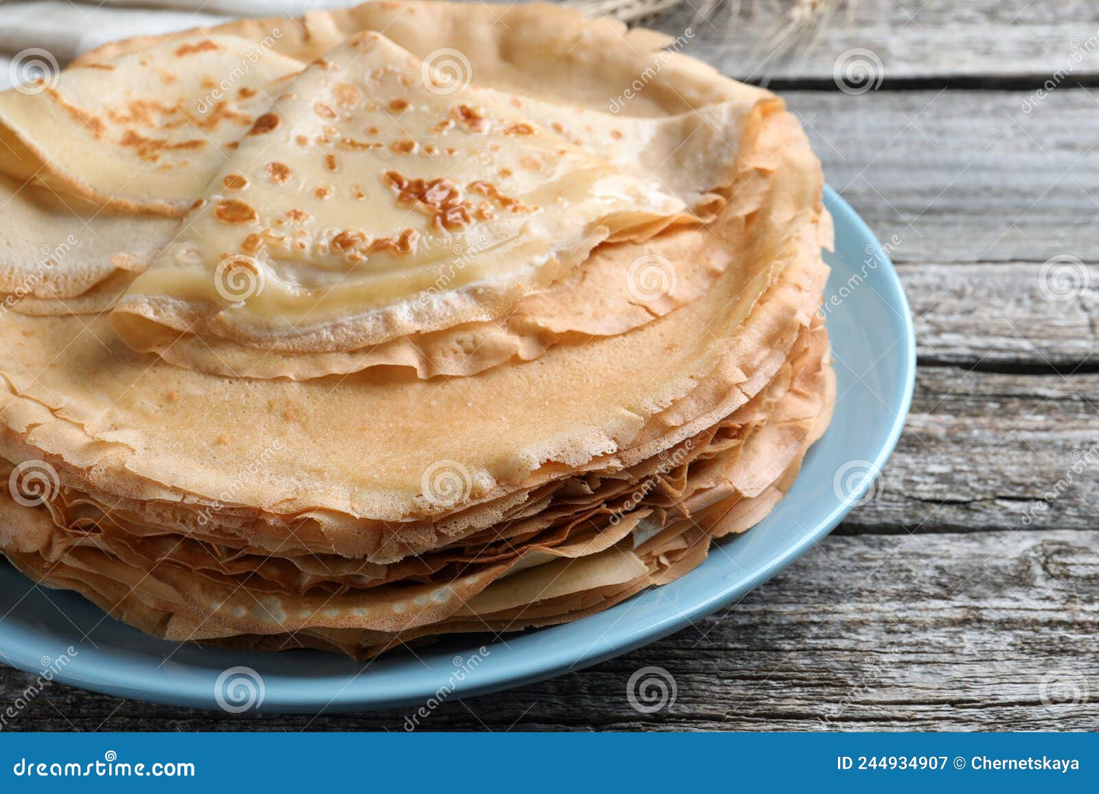 Stack of Delicious Crepes on Wooden Table, Closeup Stock Image - Image ...