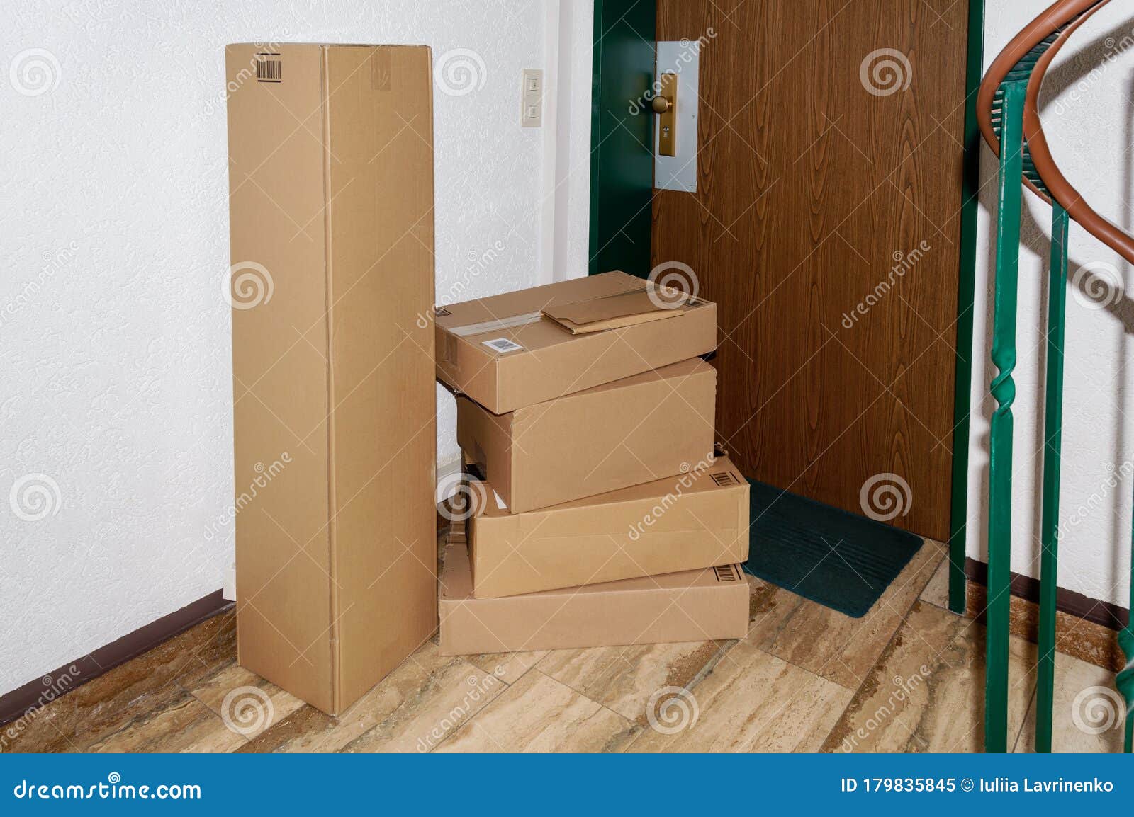 Stack of Delivered Packages in Front of a Door. Delivery Concept Stock ...