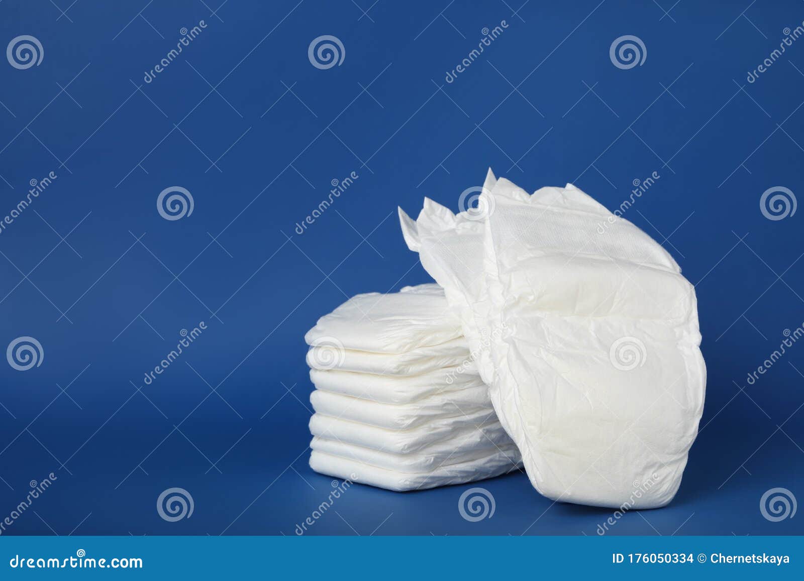 Stack of Diapers on Background. Space for Text Stock Photo - Image of ...