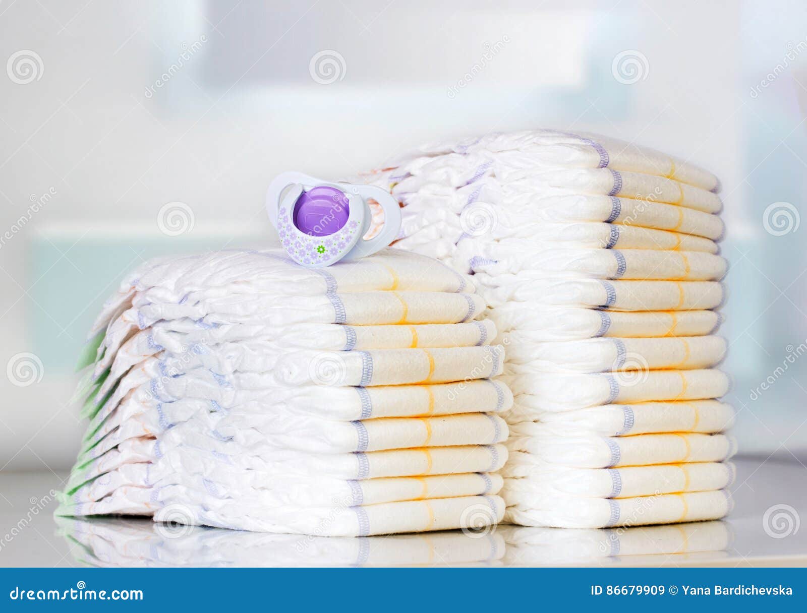 Stack of Diapers on Table Indoors. Stock Image - Image of care, diapers ...