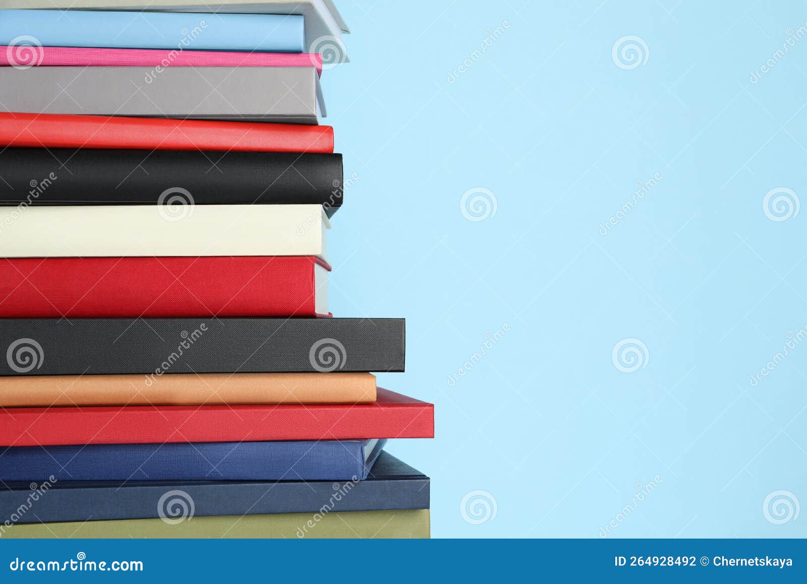 Stack of Different Books on Light Blue Background, Space for Text Stock ...