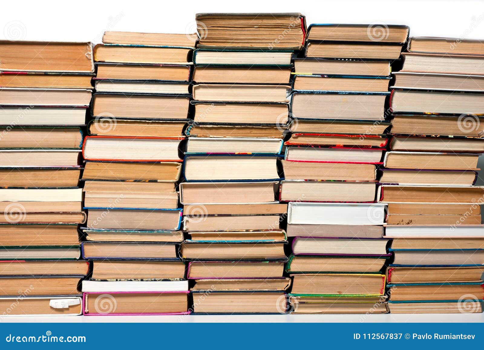 A Stack of Different Books of New and Old Folded Vertically Stock Image ...