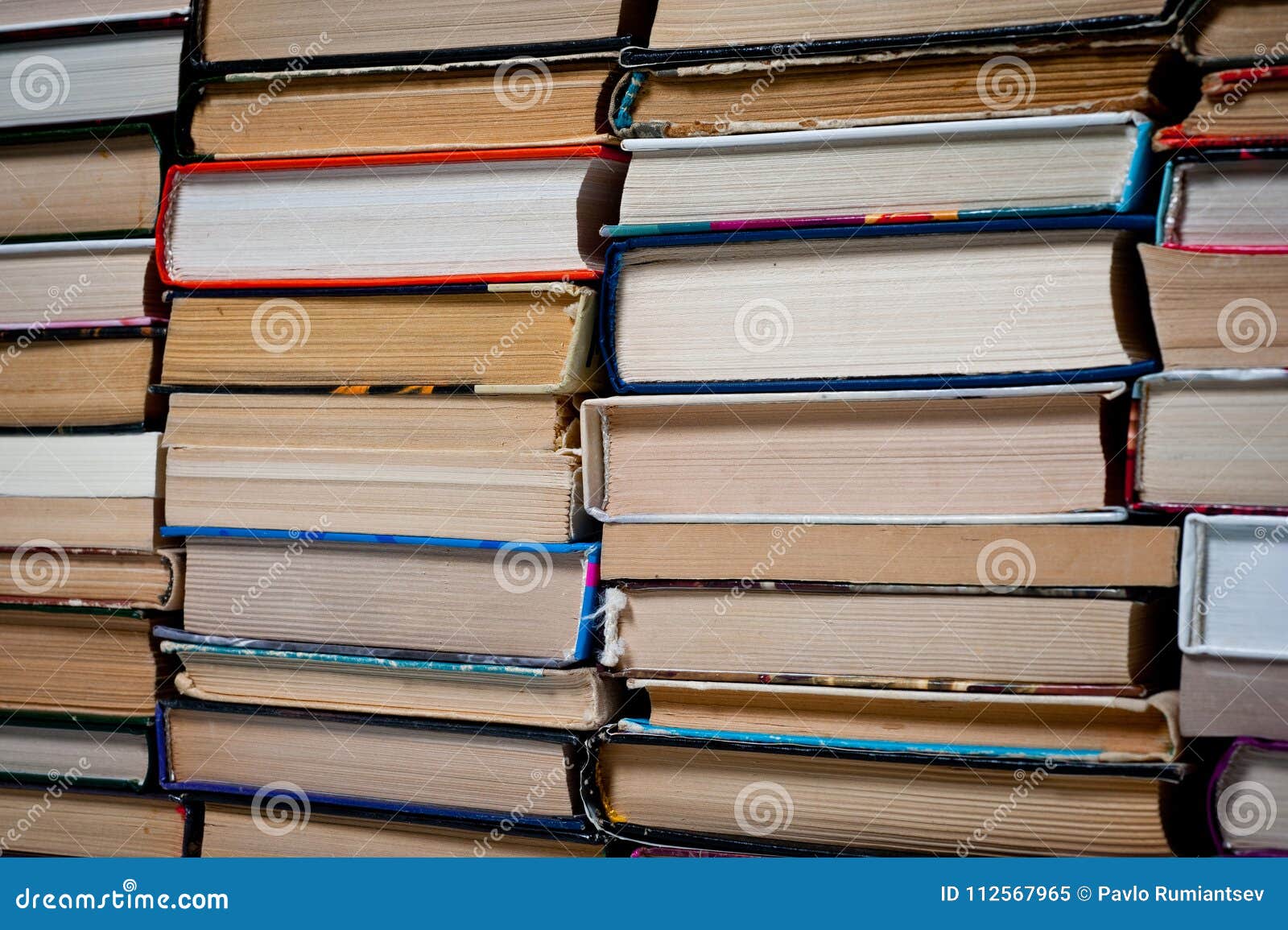 A Stack of Different Books of New and Old Folded Vertically Stock Image ...