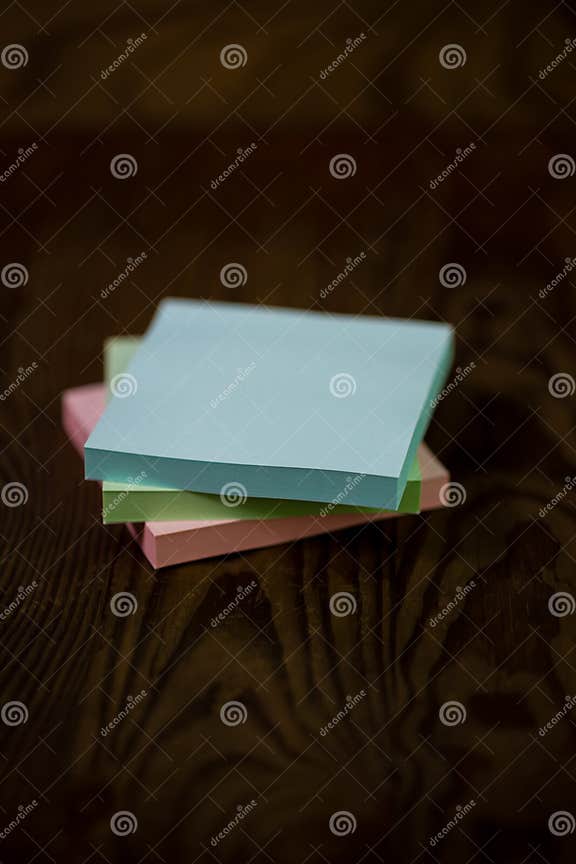 Stack of Different Colored Notepads Stock Photo - Image of message ...