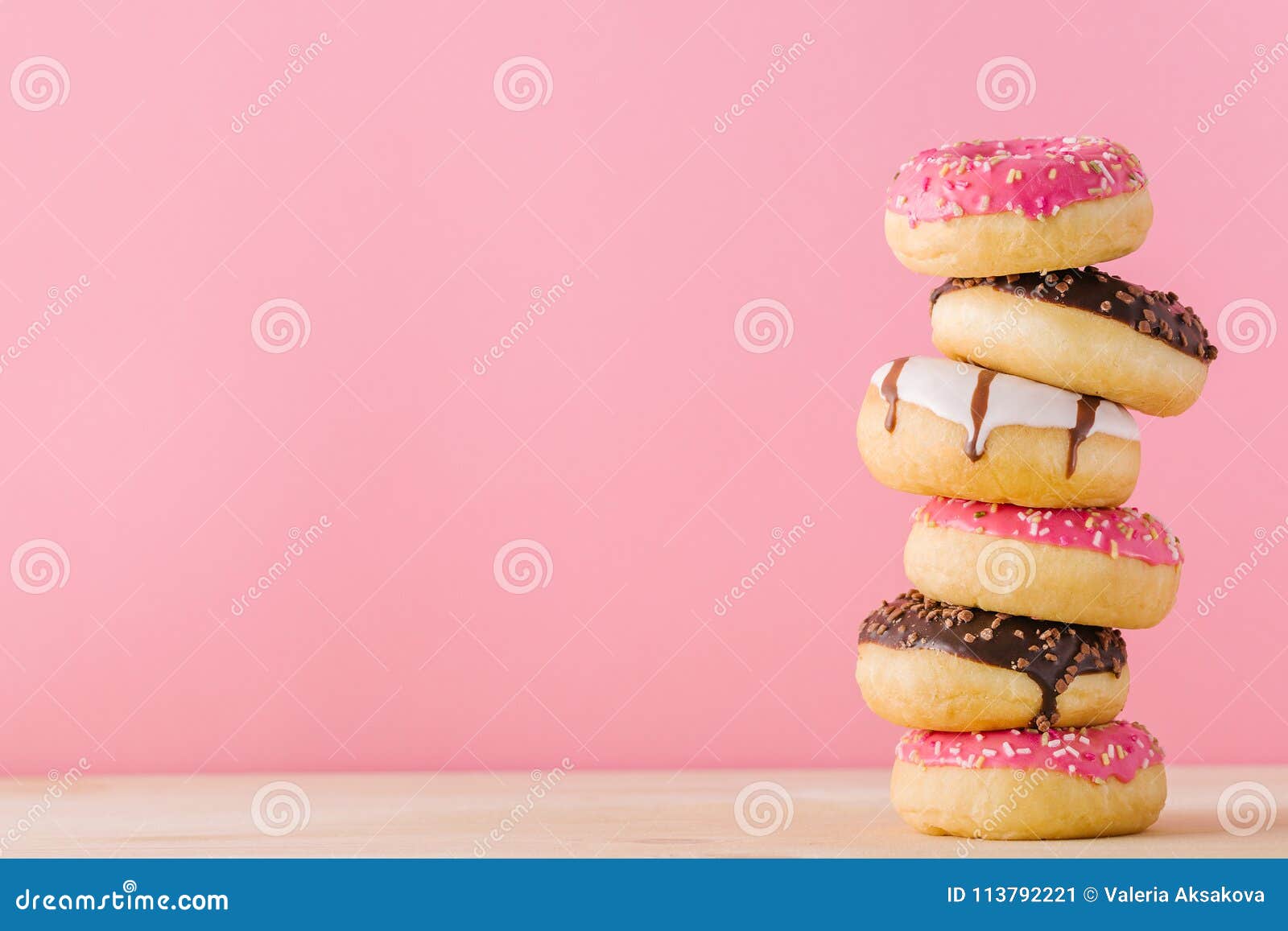 Stack of Different Donuts on Pink Stock Image - Image of culinary ...