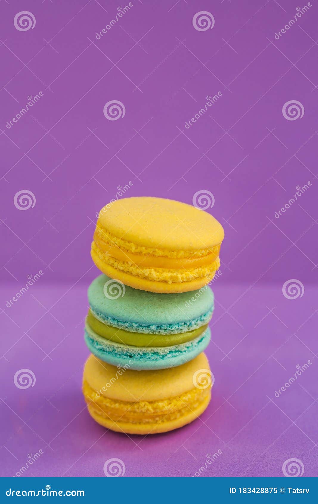 A Stack of Different Flavours of Macaroons Biscuits on Violet Purple ...