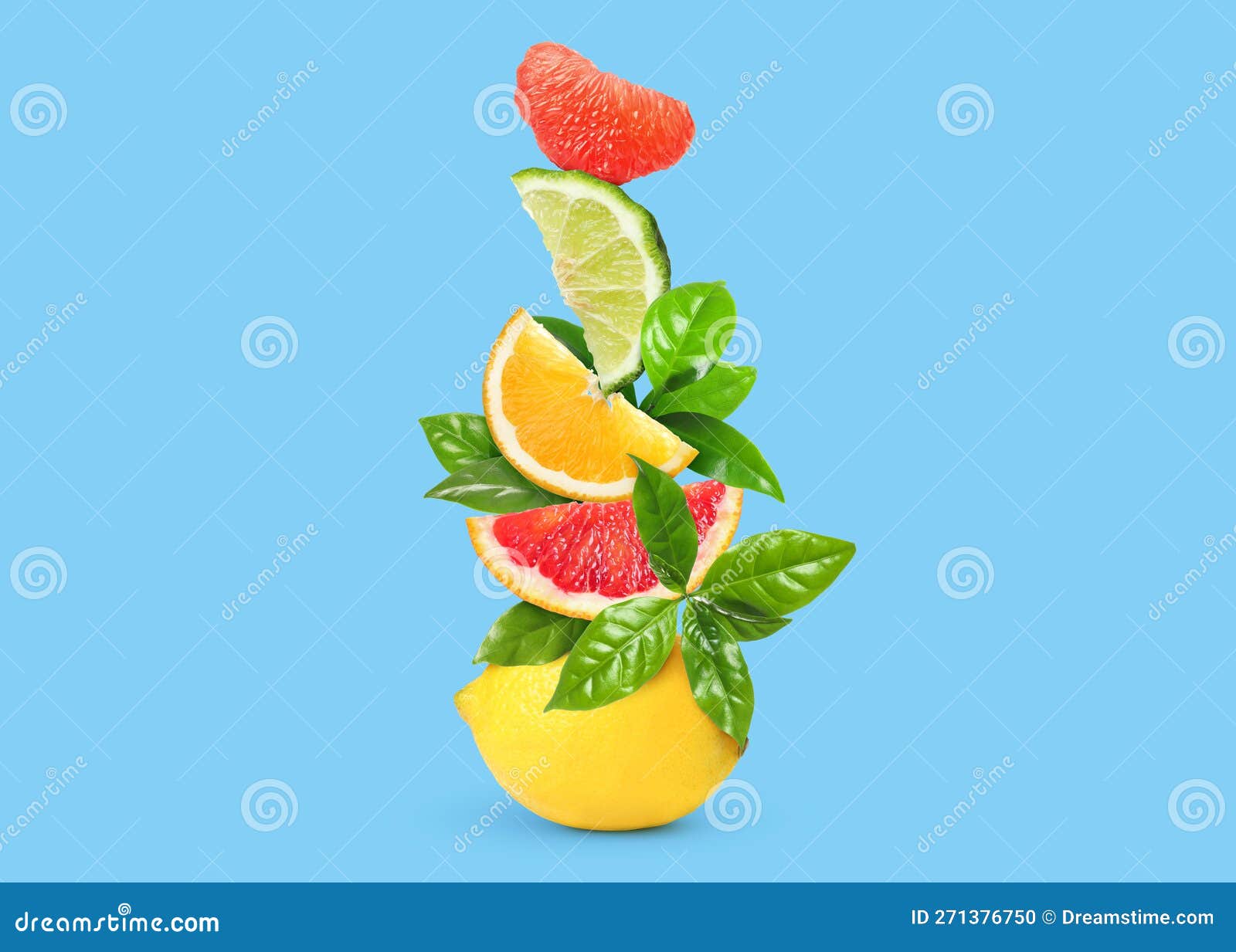 Stack of Different Fresh Citrus Fruits with Green Leaves on Light Blue ...