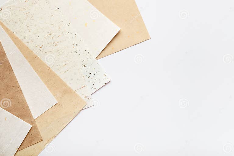 Stack of Different Handmade Paper on White Background Stock Image ...