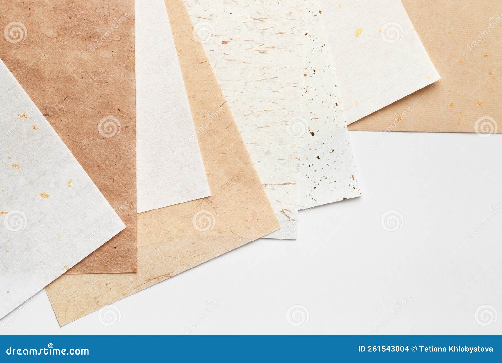 Stack of Different Handmade Paper on White Background Stock Photo ...