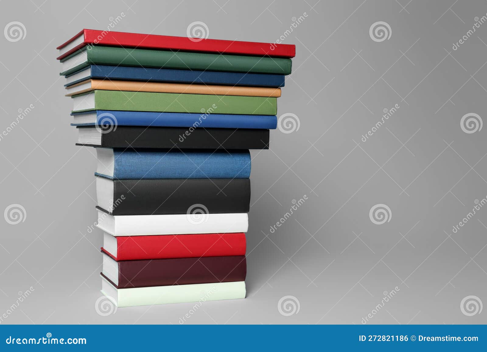Stack of Different Hardcover Books on Light Grey Background. Space for ...