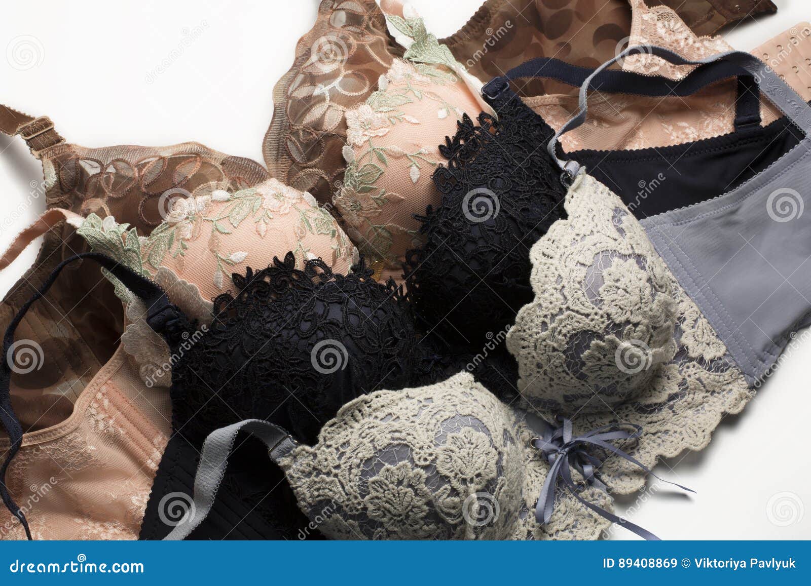 Stack of Different Lace Bras Over a White Background Stock Image ...