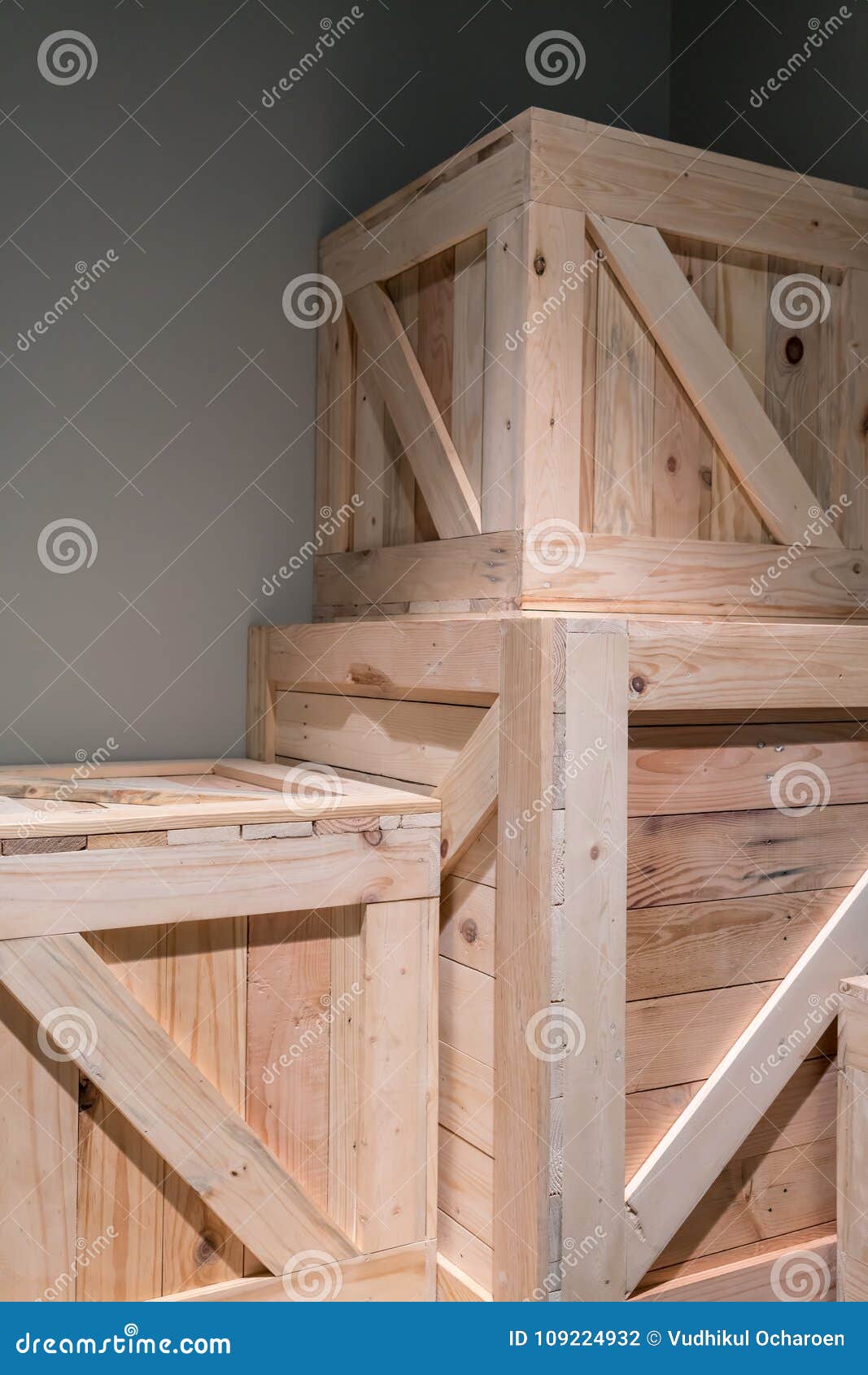 Stack of Different Sizes of Wood Boxes Against White Wall Stock Photo ...