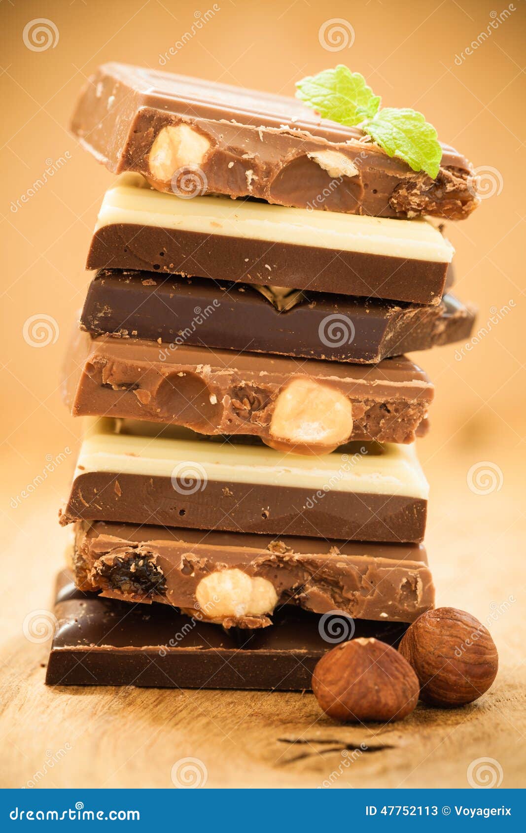 Stack of Different Sorts Chocolate and Hazelnuts Stock Image - Image of ...