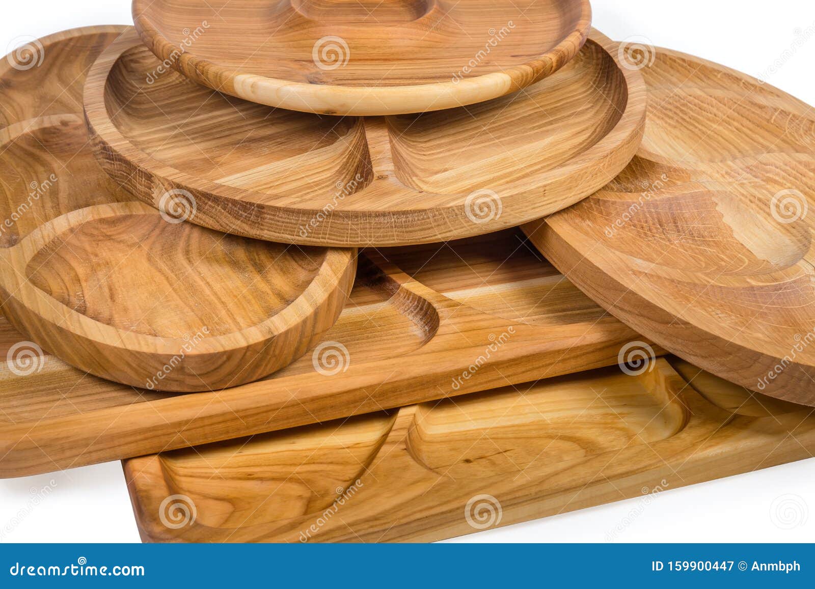 Stack of Different Wooden Compartment Dishes and Serving Boards Closeup ...