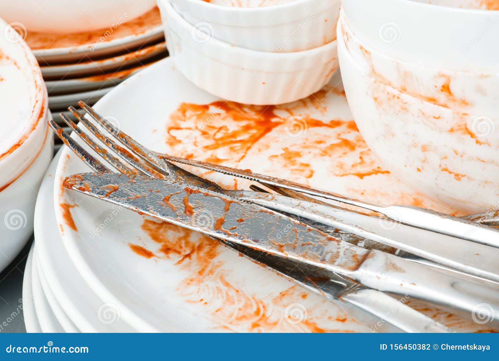 Stack of Dirty Dishes with Cutlery Stock Photo - Image of plate, dishes ...