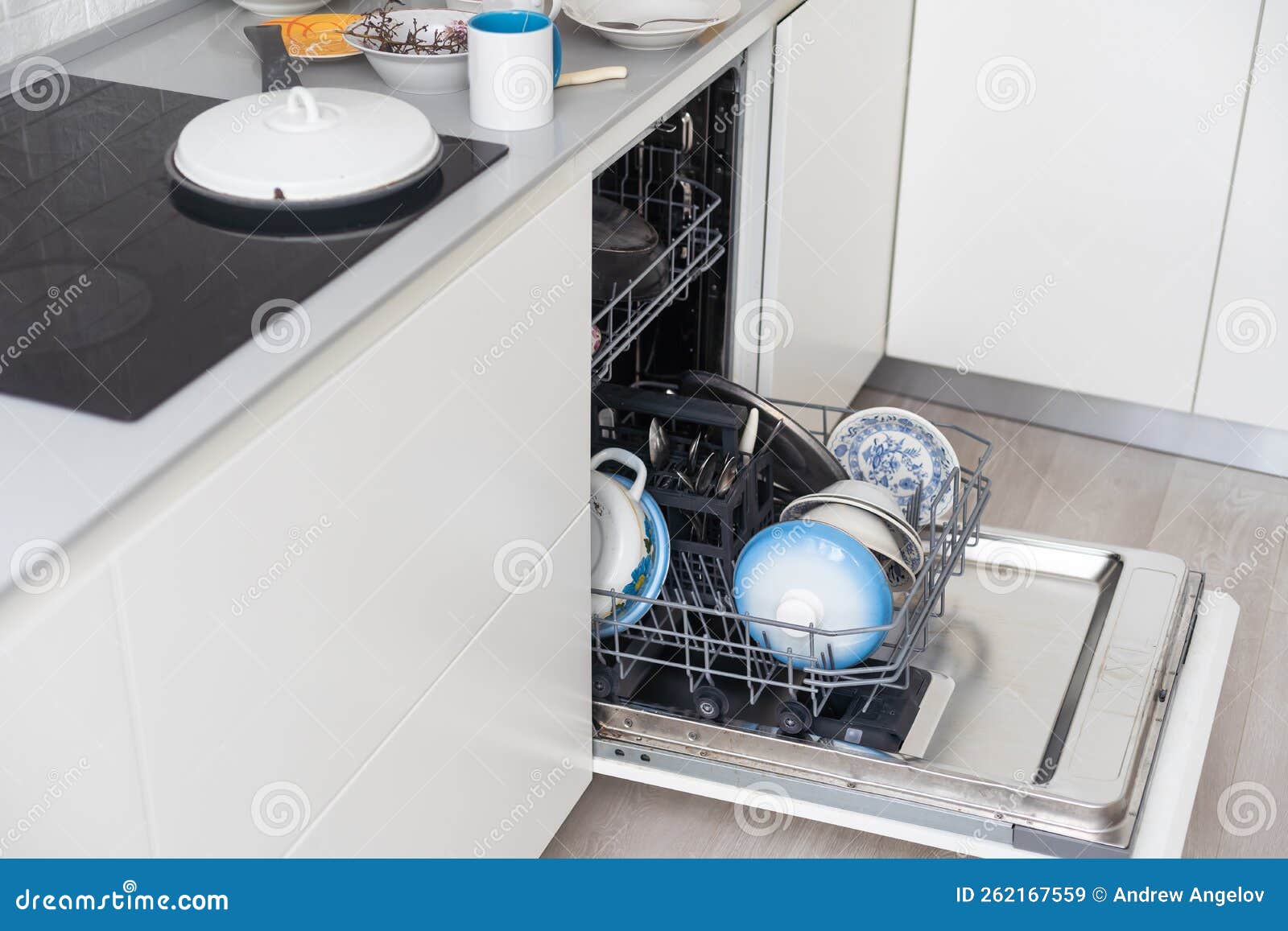 A Stack of Dirty Dishes is on the Door of the Dishwasher. Stock Image ...