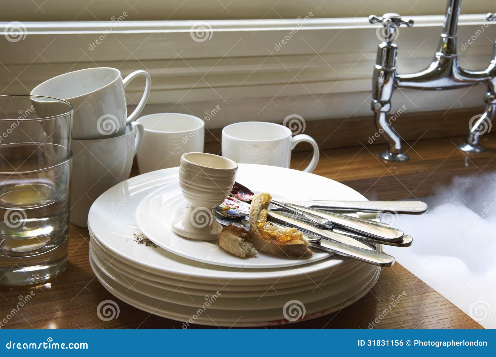 Stack of Dirty Dishes and Silverware by Sink Stock Photo - Image of ...
