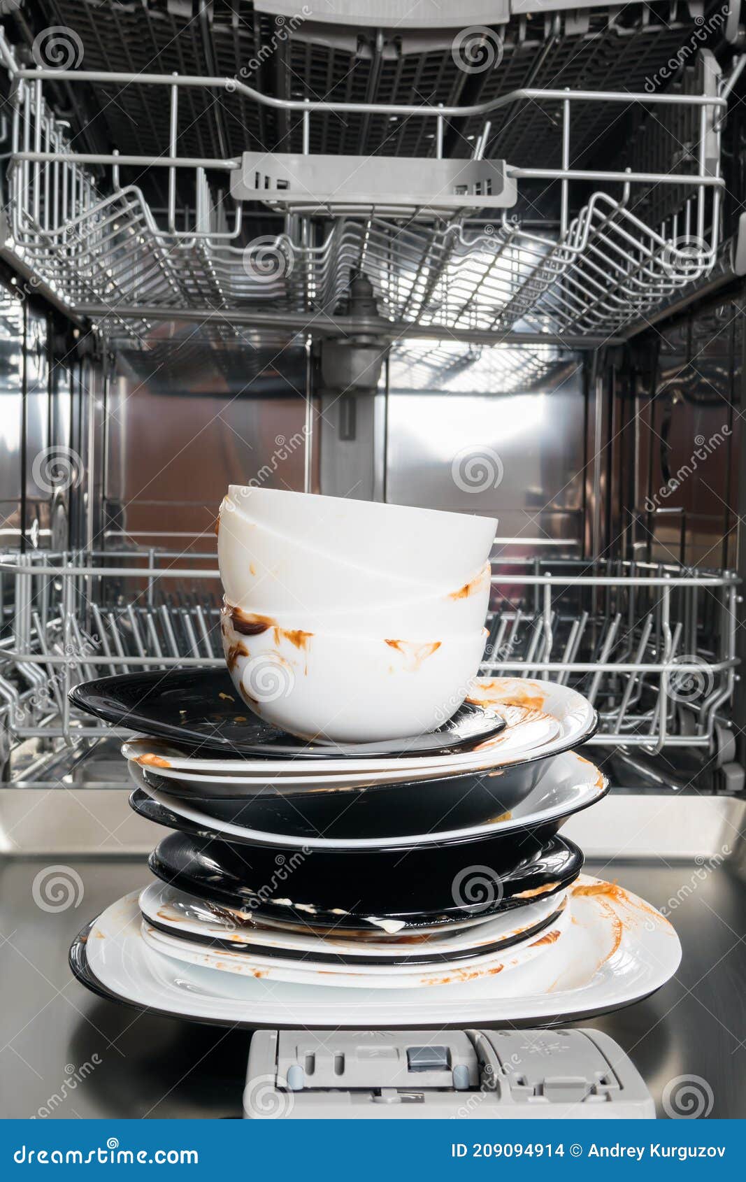 A Stack of Dirty Dishes Stands on the Door of the Dishwasher Front View ...