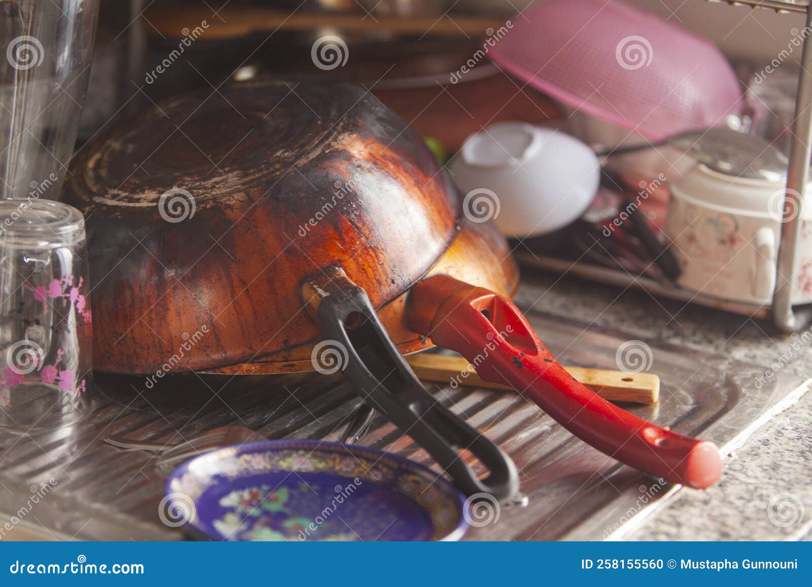 Stack of Dirty in the Sink , Stack of Used Frying Pans, Sink Full of ...