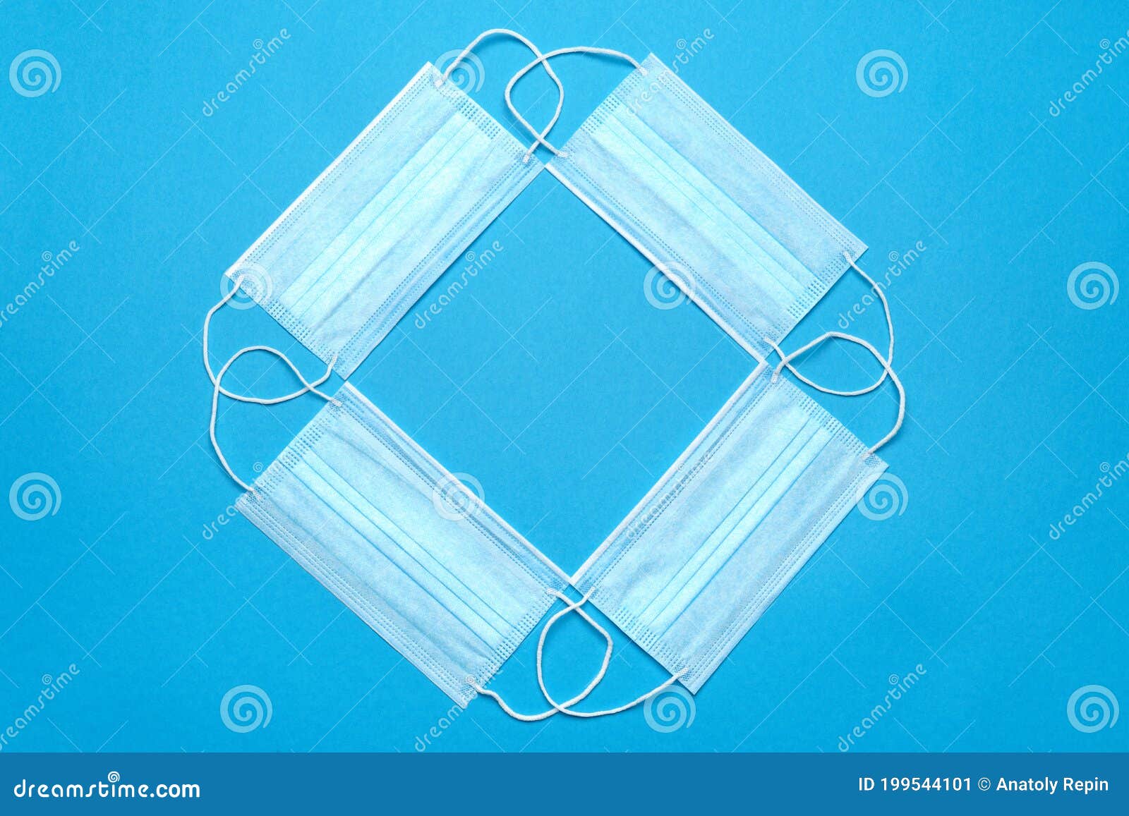 Stack of Disposable Blue Medical Face Masks on Blue Background Stock ...