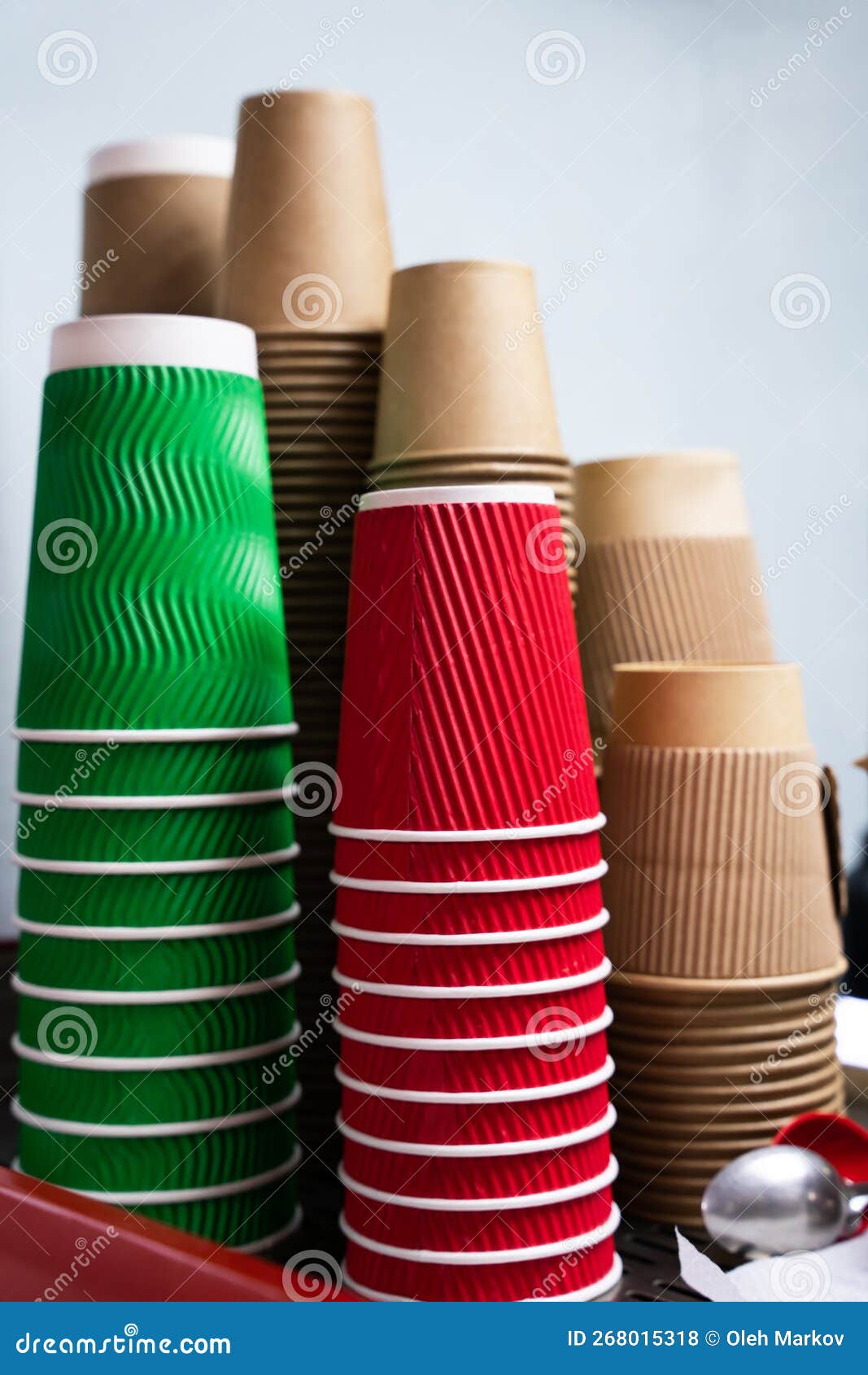 A Stack of Disposable Colorful Paper Cups in a Cafe. Paper Cups from ...