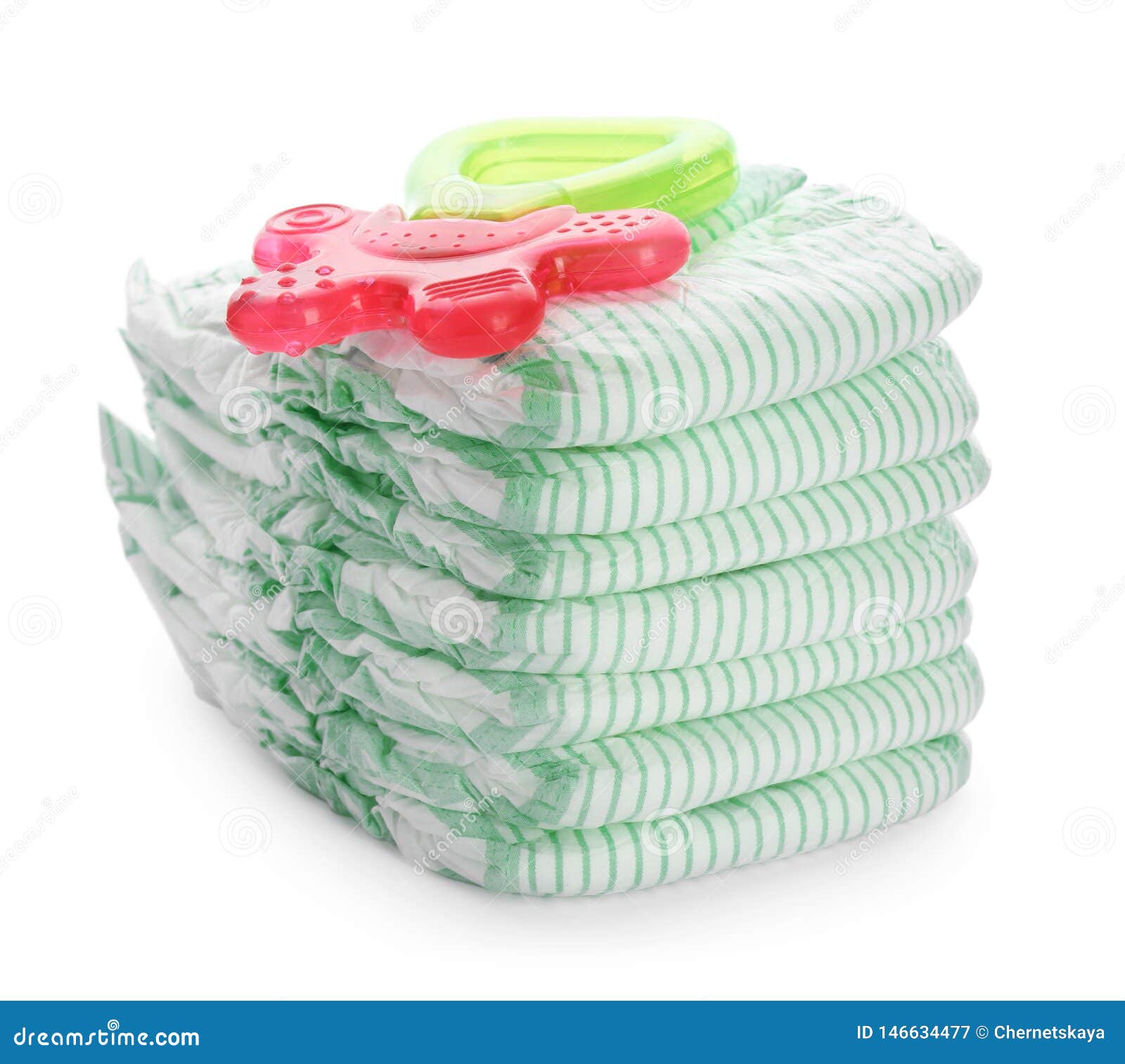 Stack of Disposable Diapers and Teether on White Background Stock Image ...