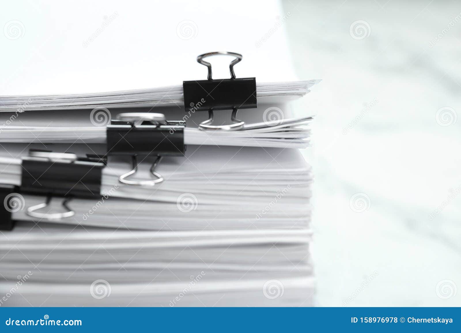 Stack of Documents with Binder Clips on Table, Closeup Stock Photo ...