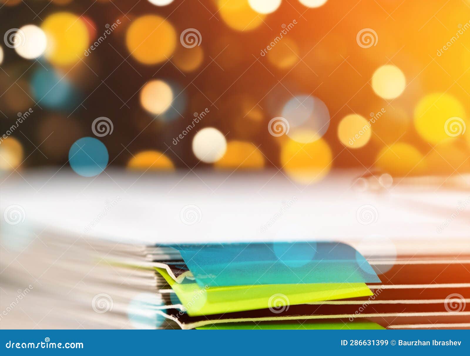 Stack Documents on the Desk in the Office and a Background of Golden ...