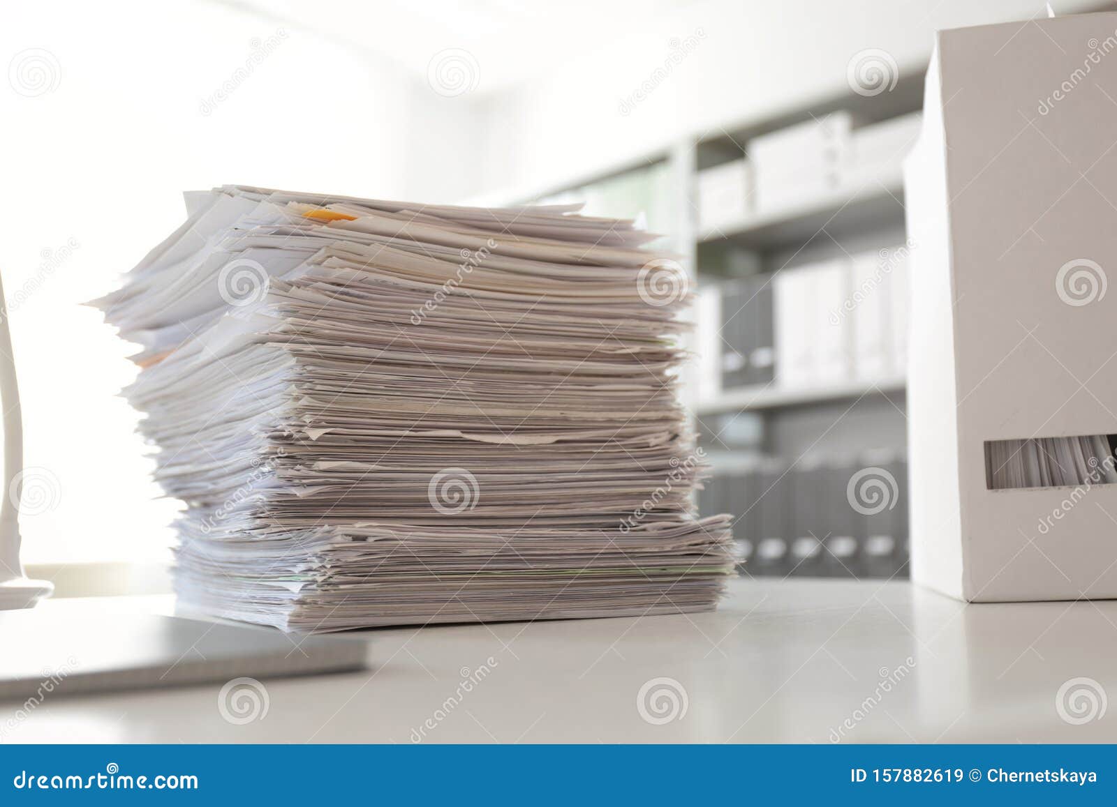 Stack of Documents and Folder with Papers on Table Stock Image - Image ...