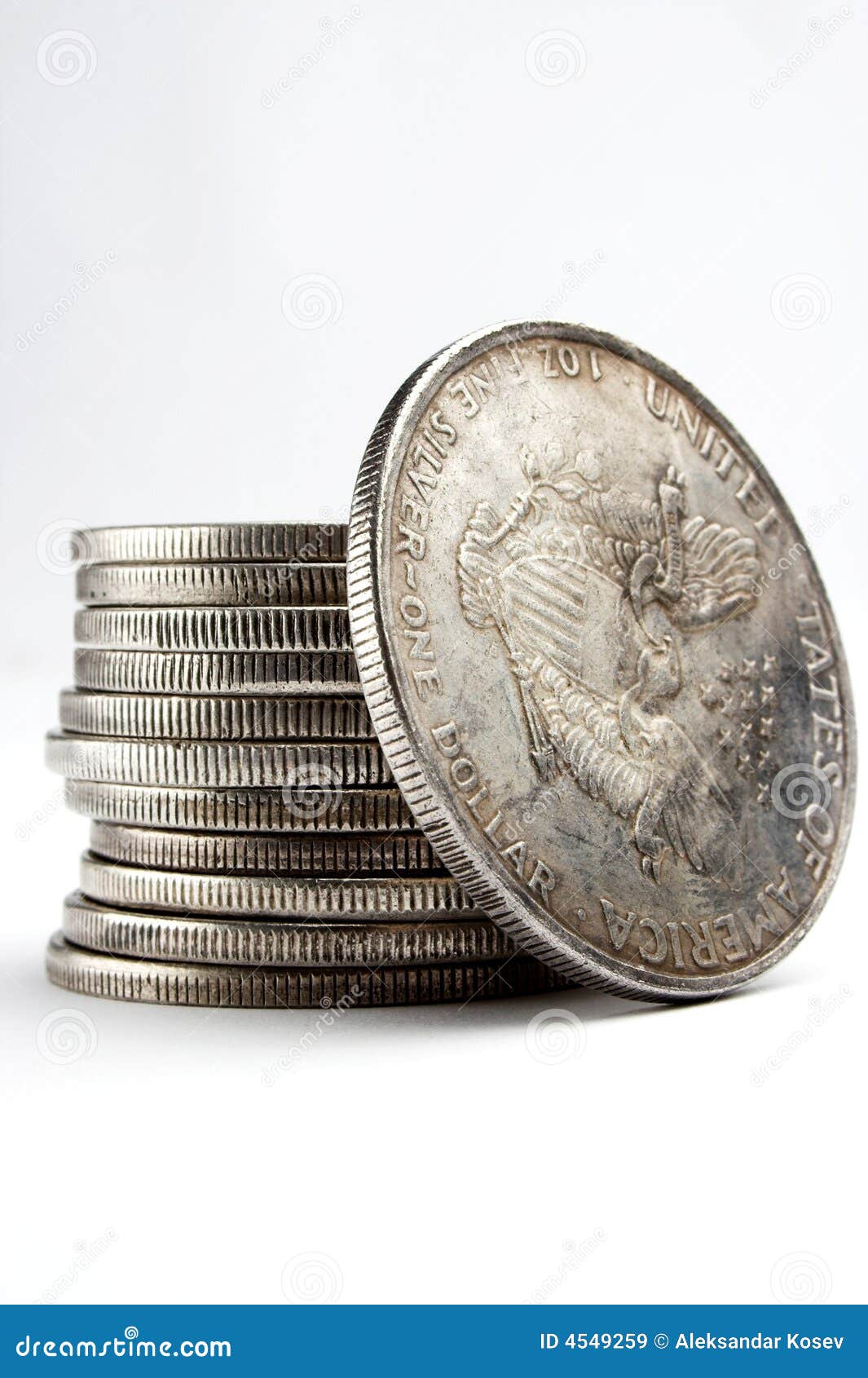 Stack of dollars and coins stock image. Image of accounting - 4549259 Stack of dollars and coins stock image. Image of accounting - 4549259
