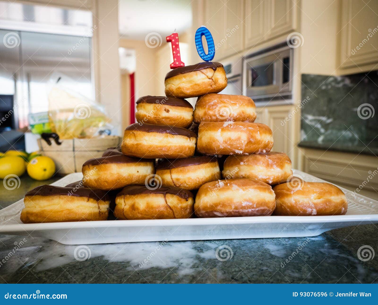 Stack of Donuts with Birthday Candle Stock Photo - Image of doughnut ...