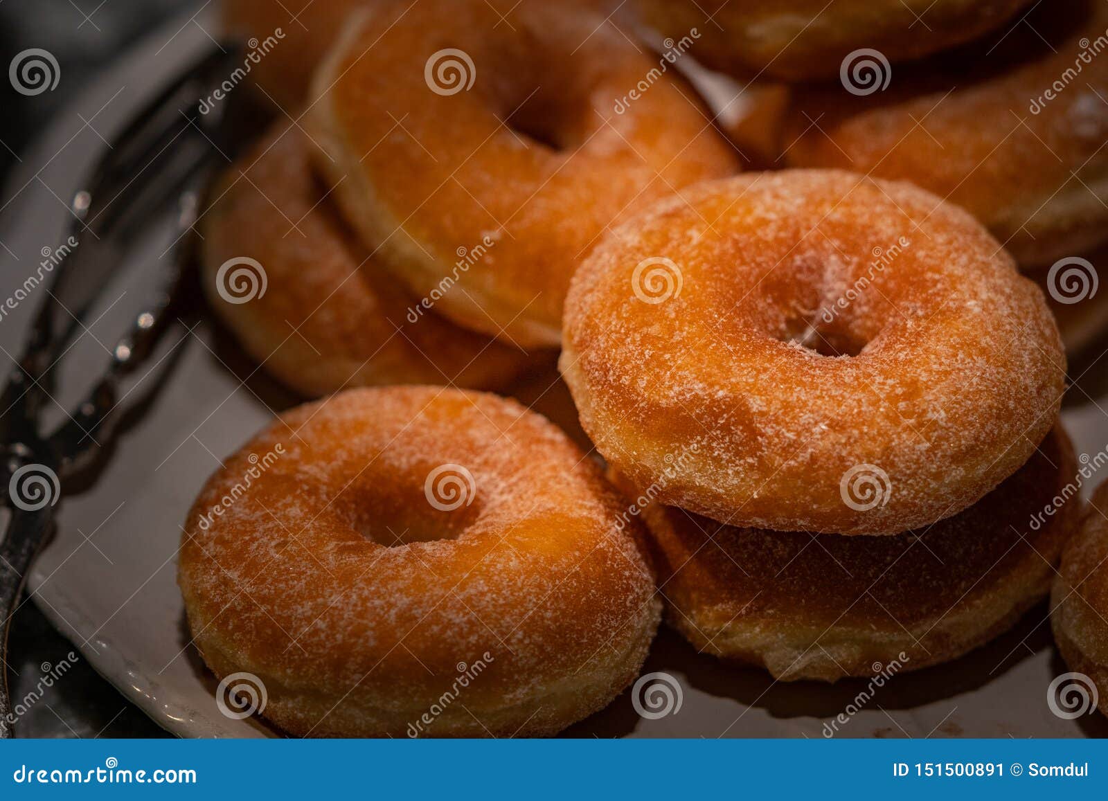 Stack of donuts on plate stock image. Image of doughnut - 151500891