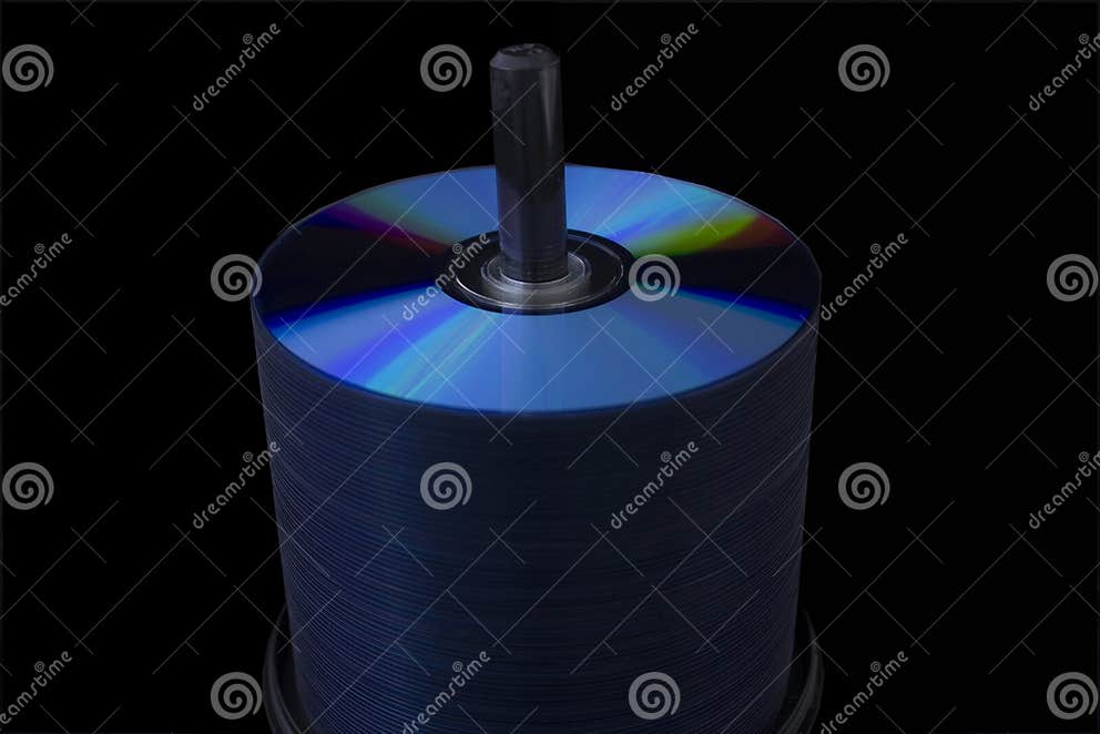 Stack of DVDs CDs Blu-ray on a Black Background Stock Image - Image of ...