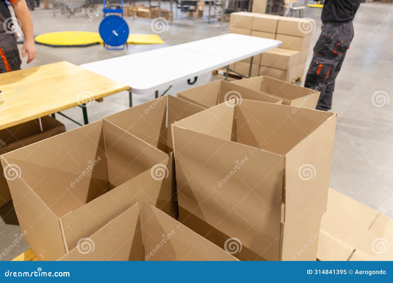 Stack of Empty Cardboard Boxes at a Packaging Station in a Warehouse ...