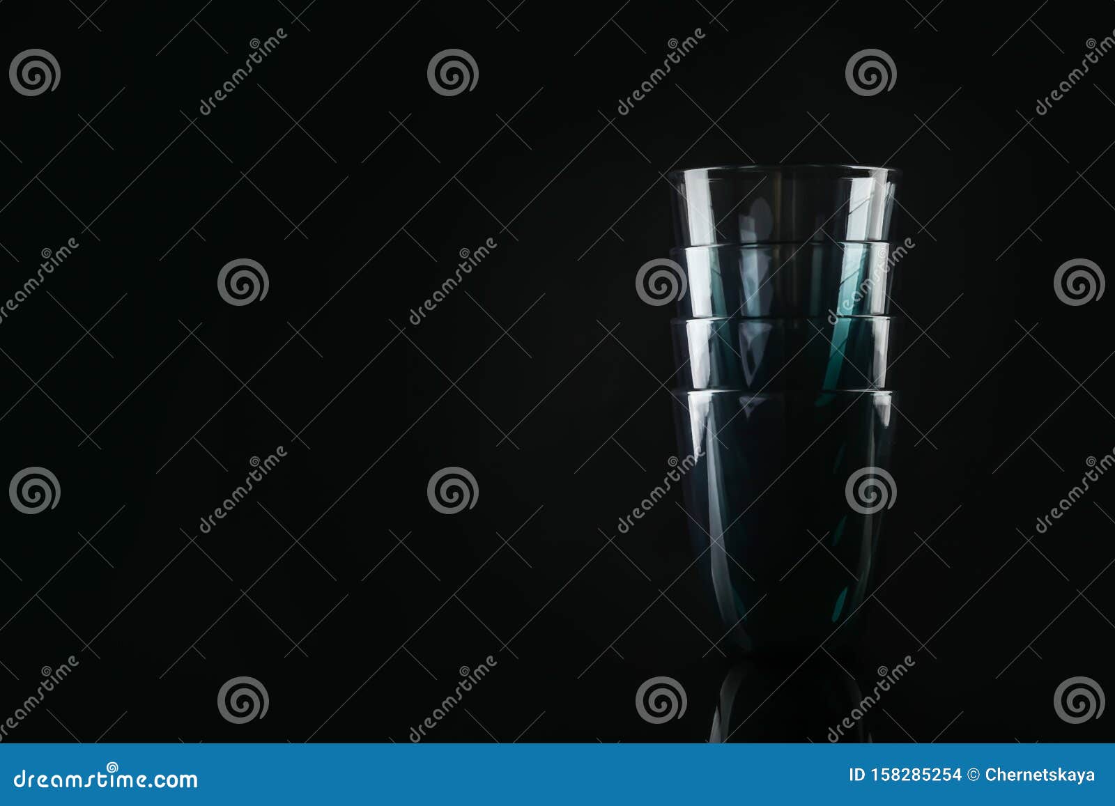 Stack of Empty Colorful Glasses on Black Background Stock Photo - Image ...