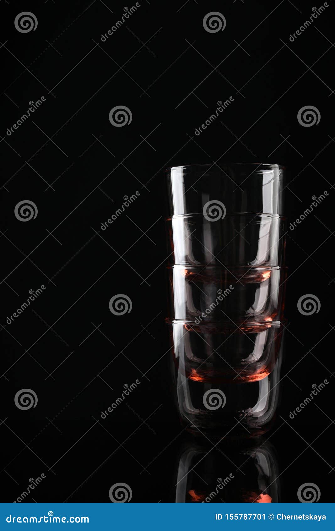 Stack of Empty Colorful Whiskey Glasses on Black , Space for Text Stock ...
