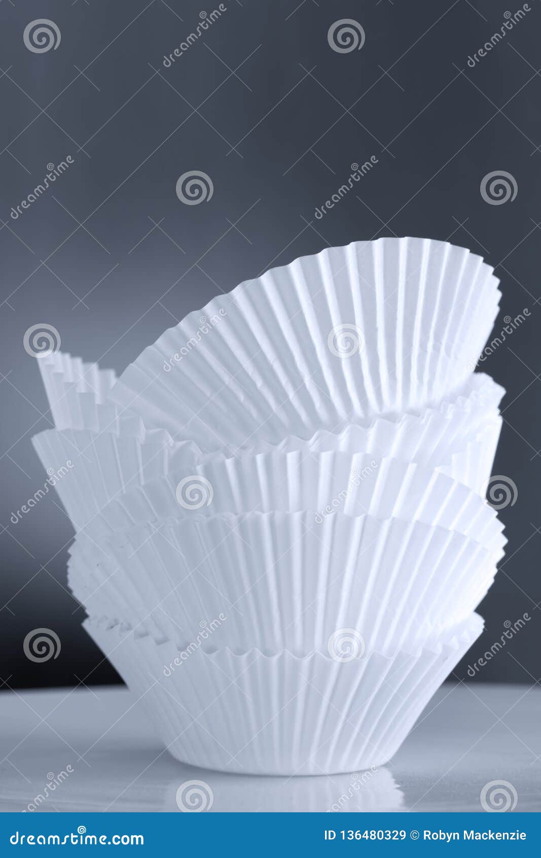 Stack of Empty Cupcake Cases Over Toned Background Stock Image - Image ...