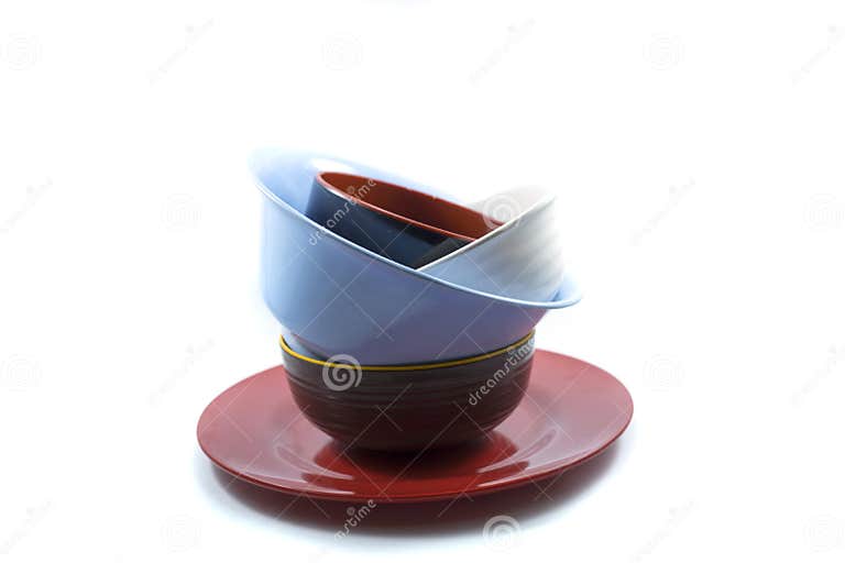 Stack of Empty Plates and Bowls Isolated on a White Stock Photo - Image ...