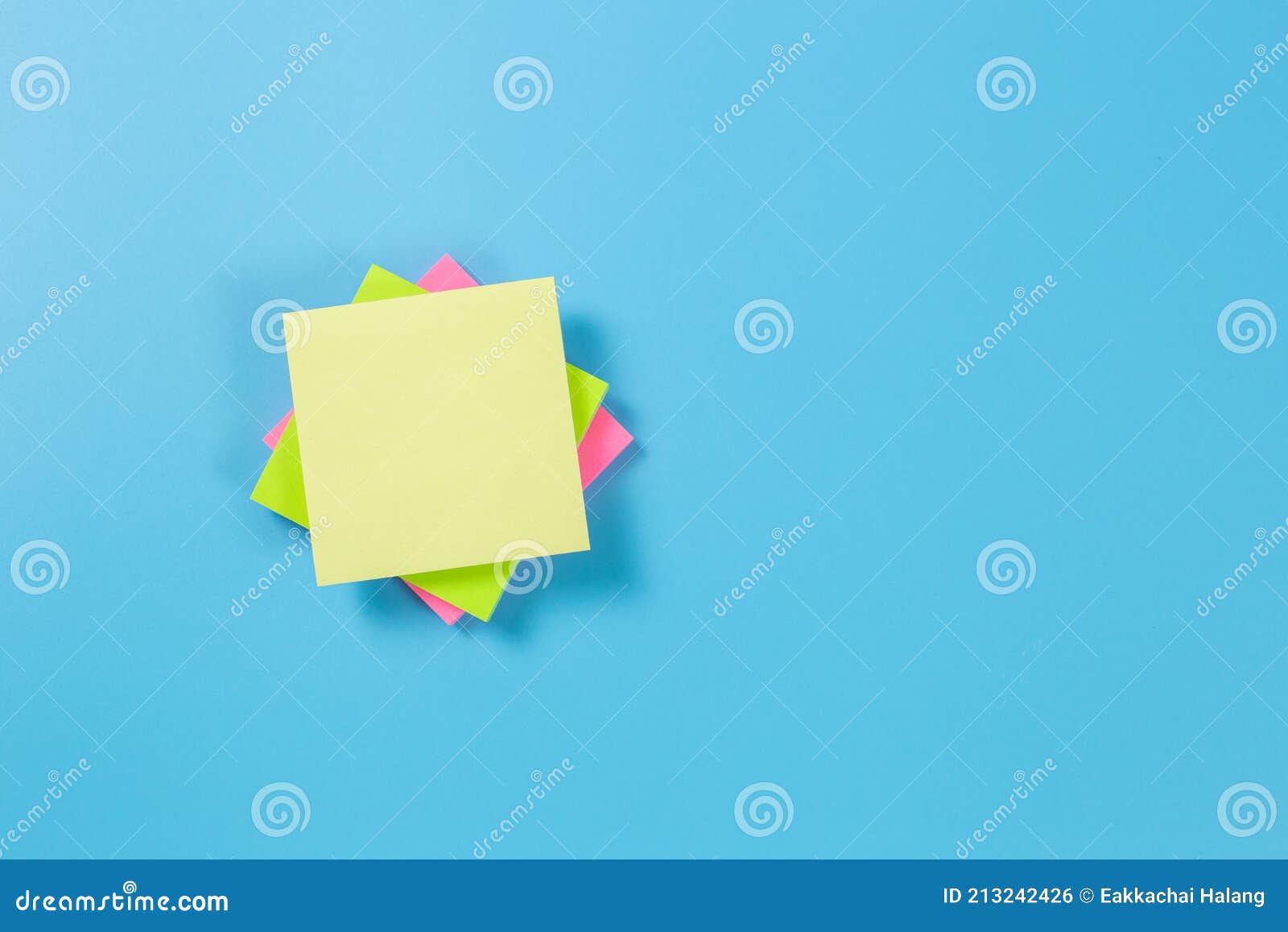Stack Empty Sticky Post Note Paper Sheet on Blue Background Stock Photo ...