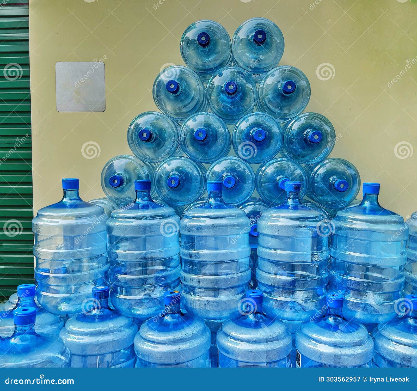 Stack of Empty Water Bottles Stock Image - Image of jugs, background: 303562957