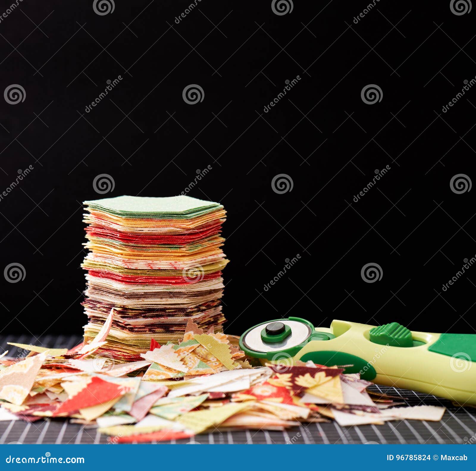 Stack English Paper Pieced Hexagons Surrounded by Scraps Over Black ...