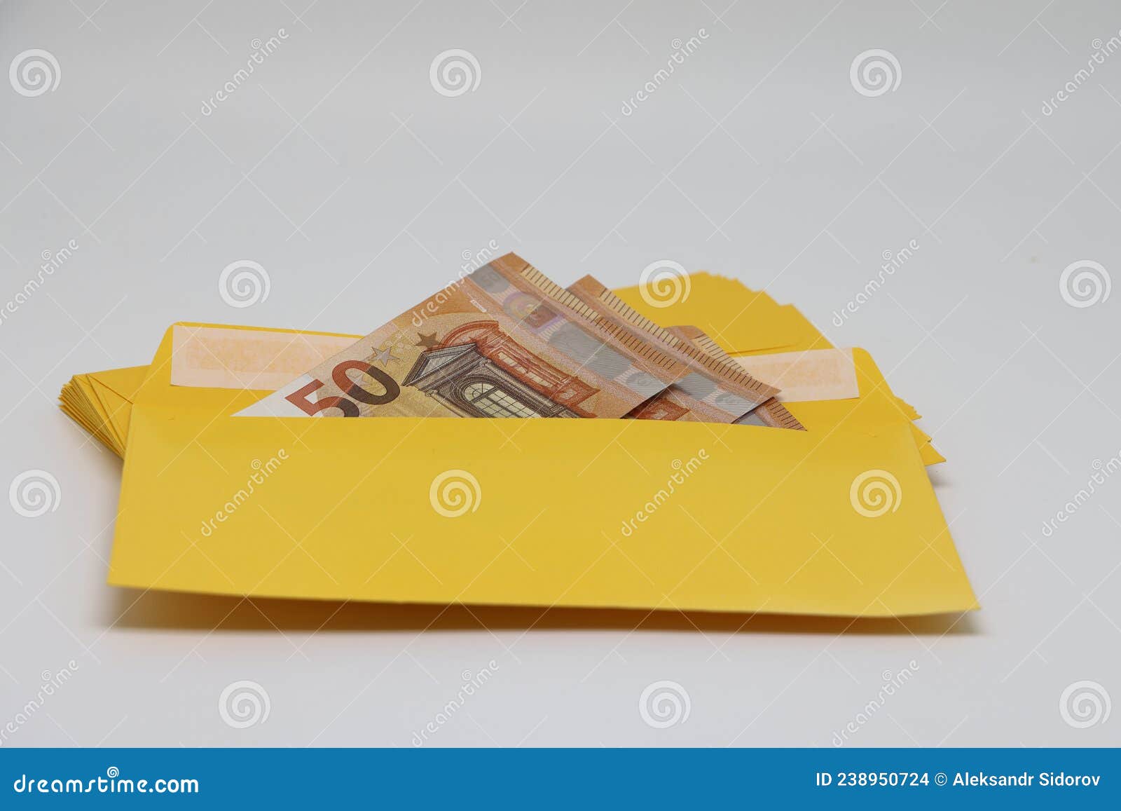 A Stack of Envelopes. Close-up with an Envelope Full of Euro Banknotes ...